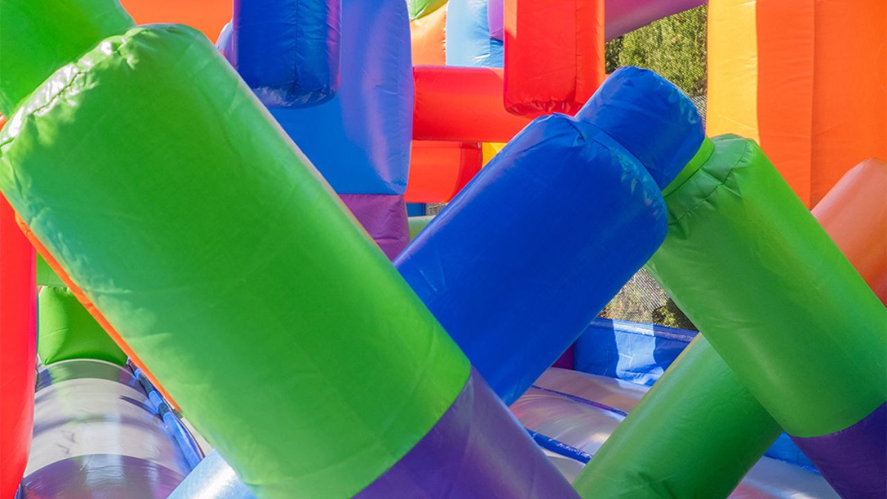 Dura-Lite PVC vs. Standard Vinyl | Bounce House Material Guide - Hero ...